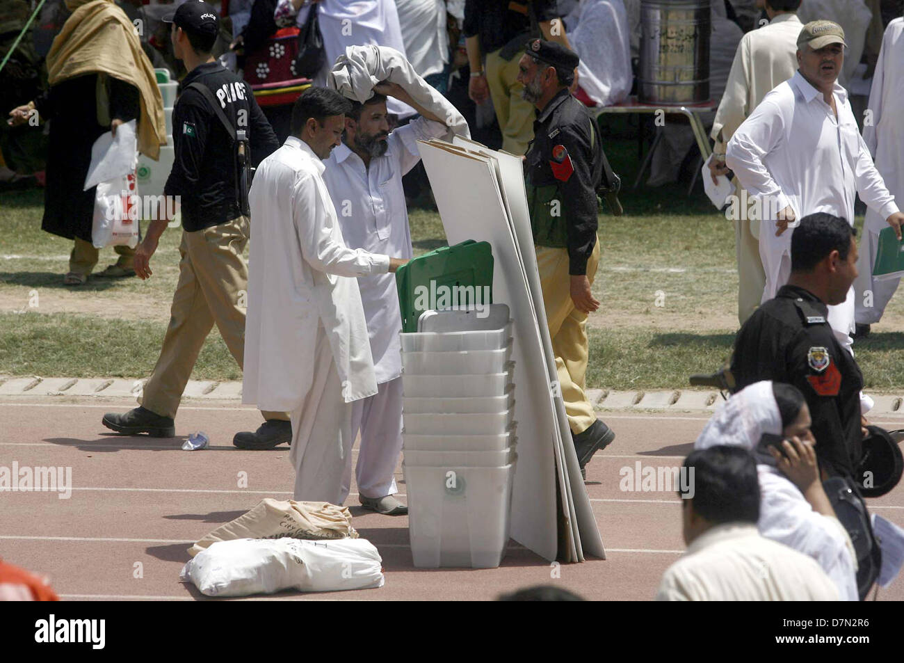 Election Presiding officials receiving ballot boxes and ballot papers ...