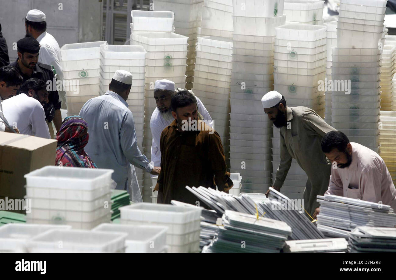 Election Presiding officials receiving ballot boxes and ballot papers ...