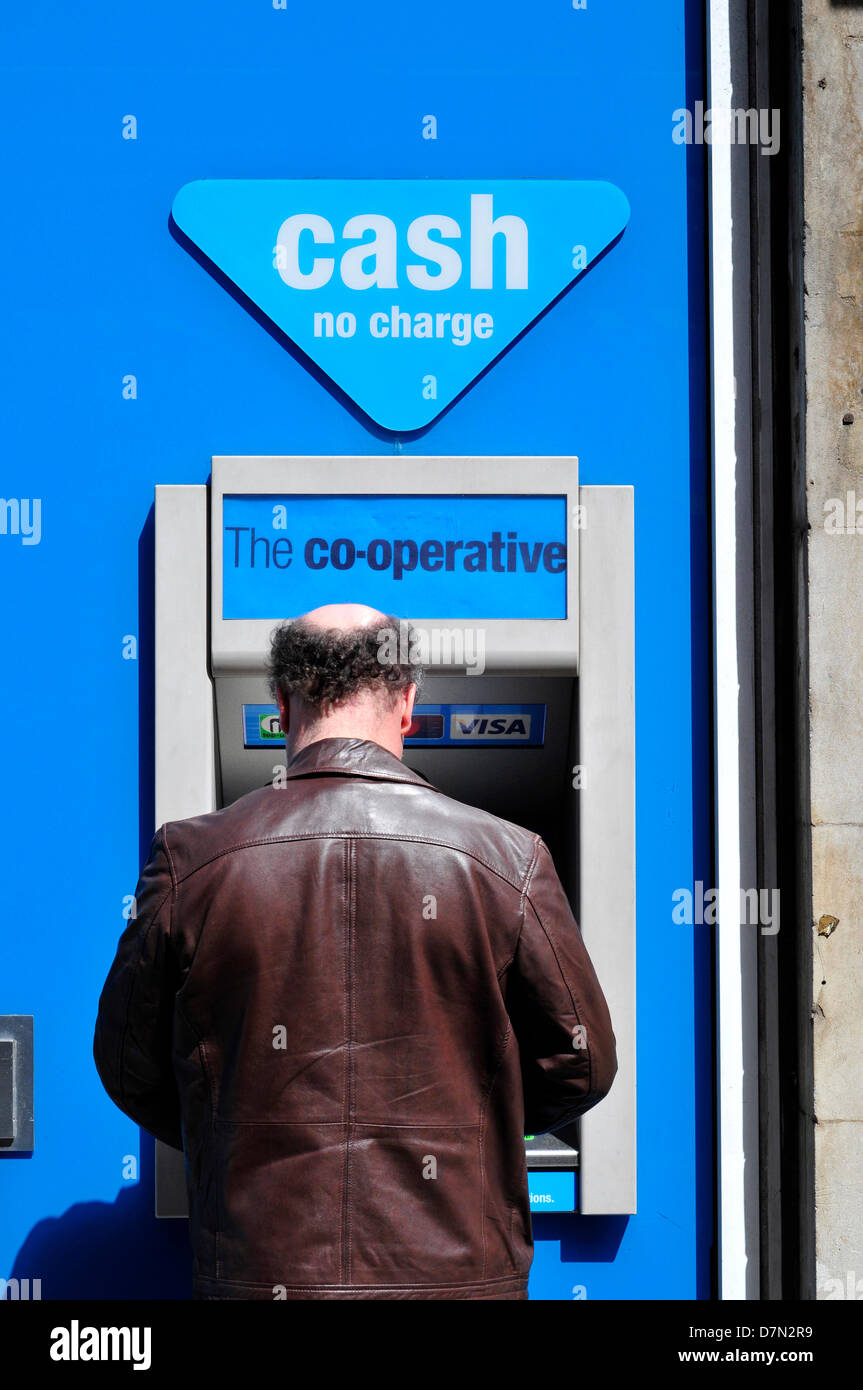Man using a atm hi-res stock photography and images - Alamy