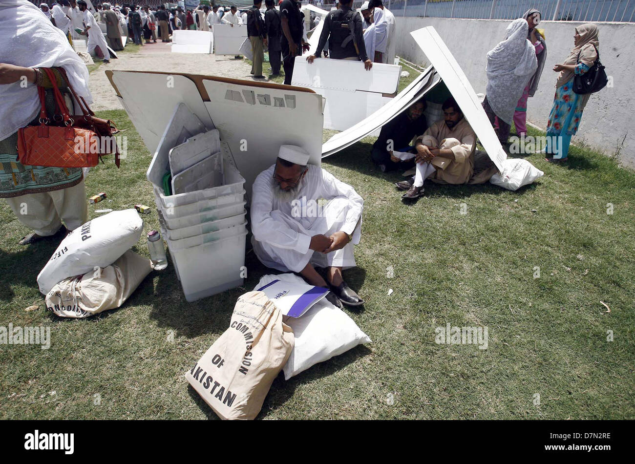 Election Presiding officials receiving ballot boxes and ballot papers ...