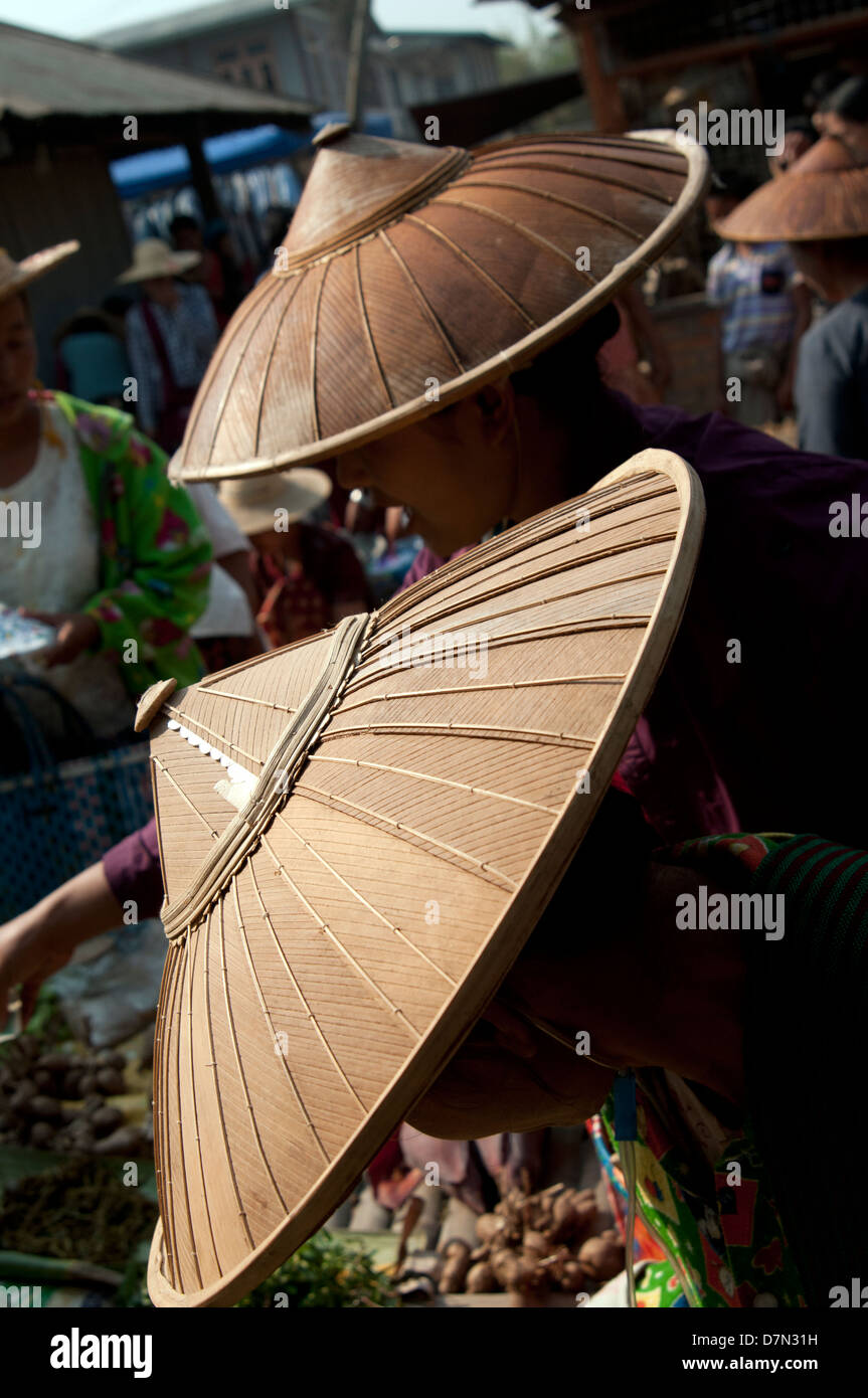 Close up of two traditional Shan states bamboo hats worn by market ...