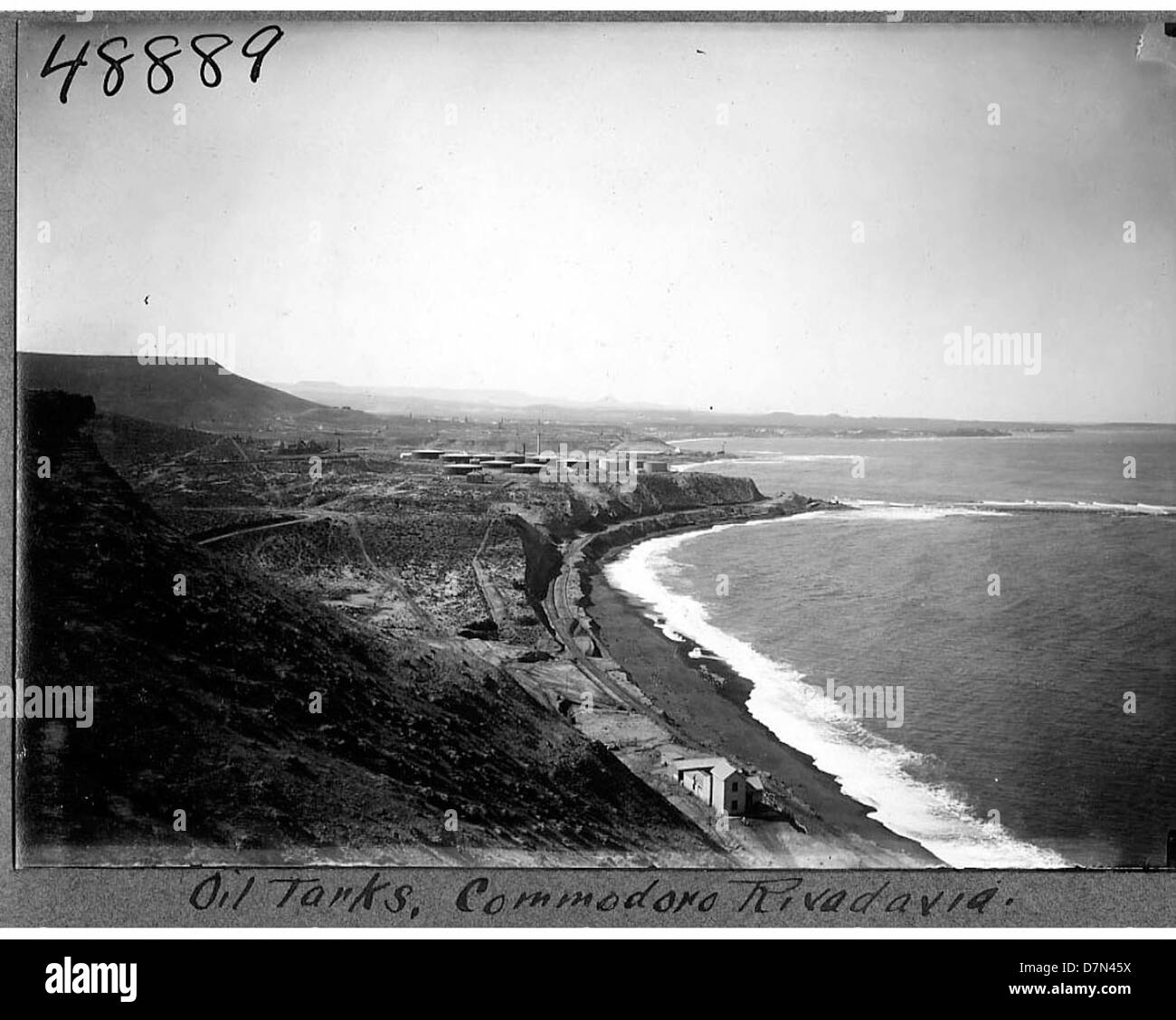 This image shows oil tanks in the distance during the Riggs expedition ...