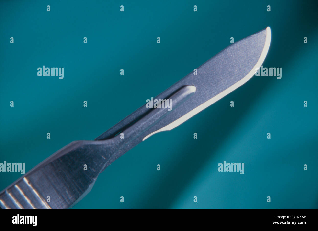 A surgical scalpel close-up on surgical green, ©mak Stock Photo - Alamy