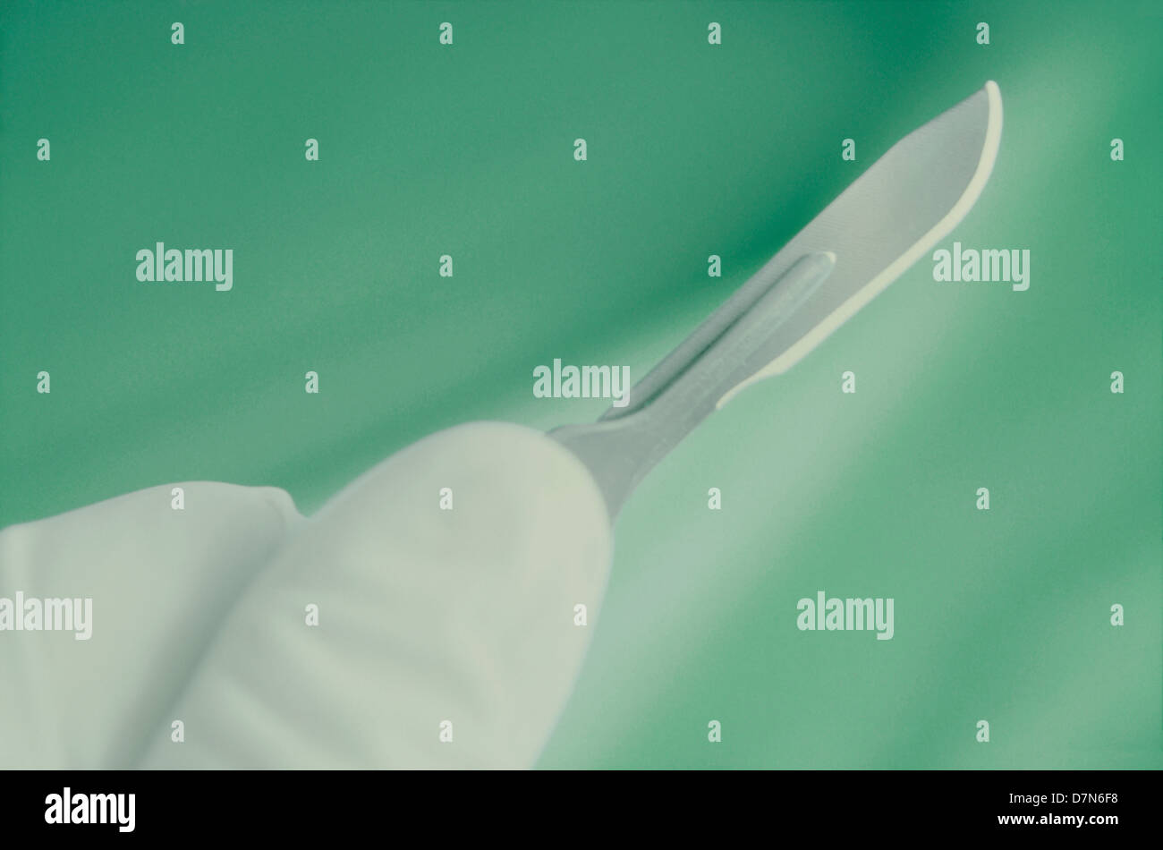 A surgical scalpel close-up on surgical green, ©mak Stock Photo - Alamy
