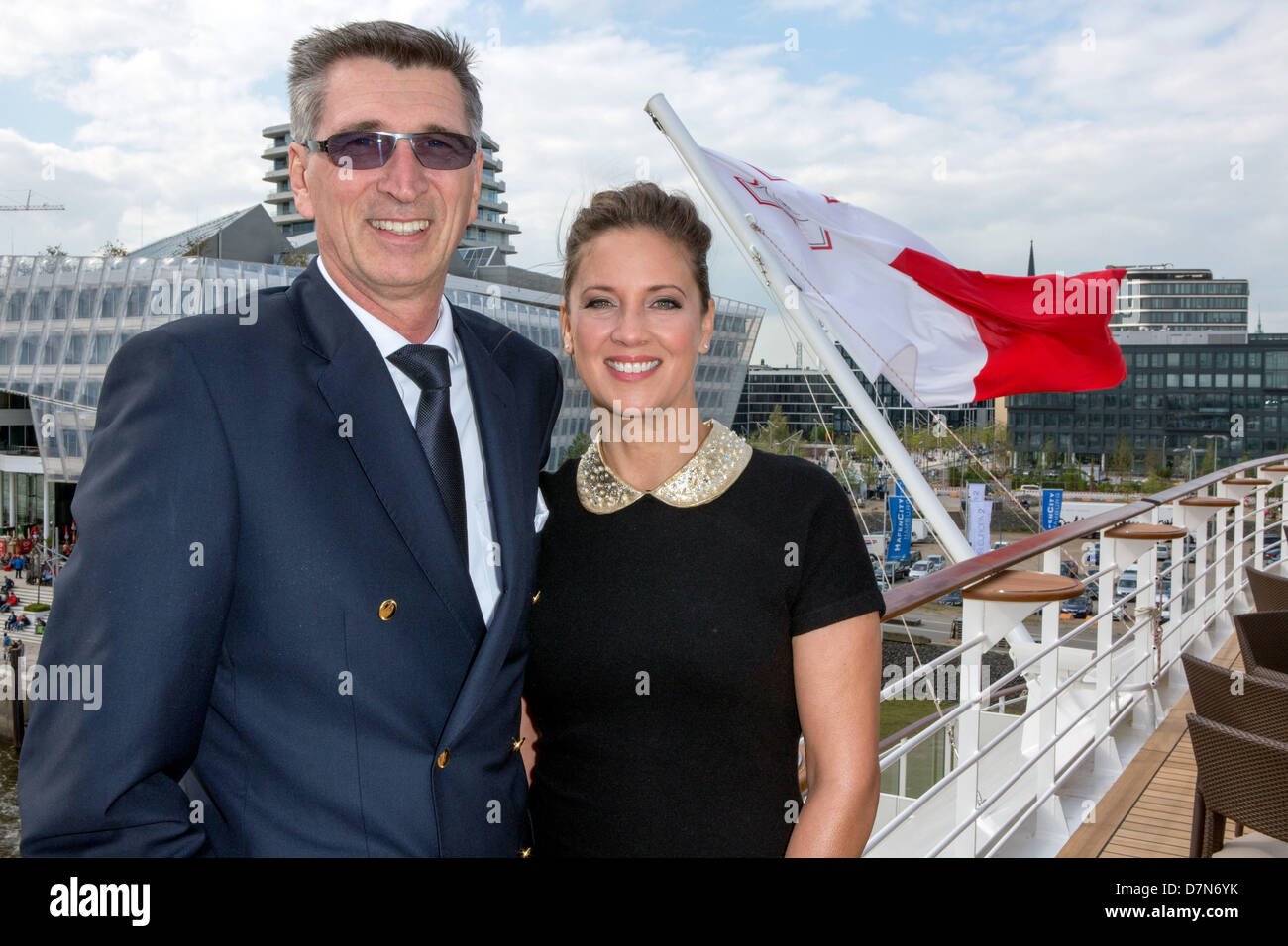 Captain Friedrich Jan Akkermann and sponsor Dana Schweiger pose on the ...