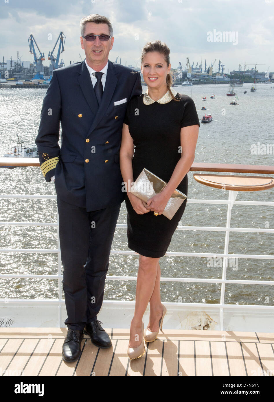 Captain Friedrich Jan Akkermann and sponsor Dana Schweiger pose on the ...