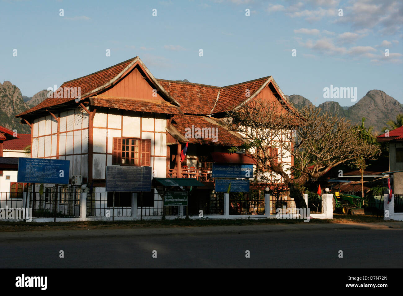 Restored traditional house in Vang Vieng housing an NGO Stock Photo - Alamy