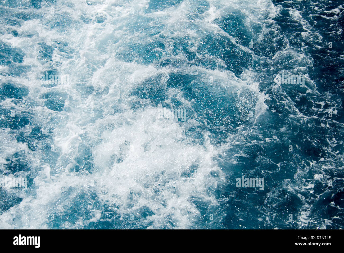 Frothy Mediterranean sea blue water Stock Photo - Alamy