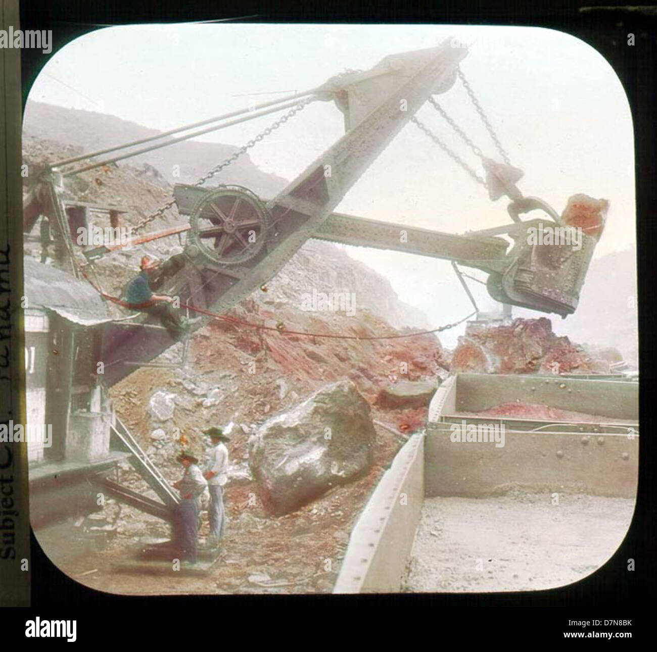 This image captures the operation of a large steam shovel during the ...