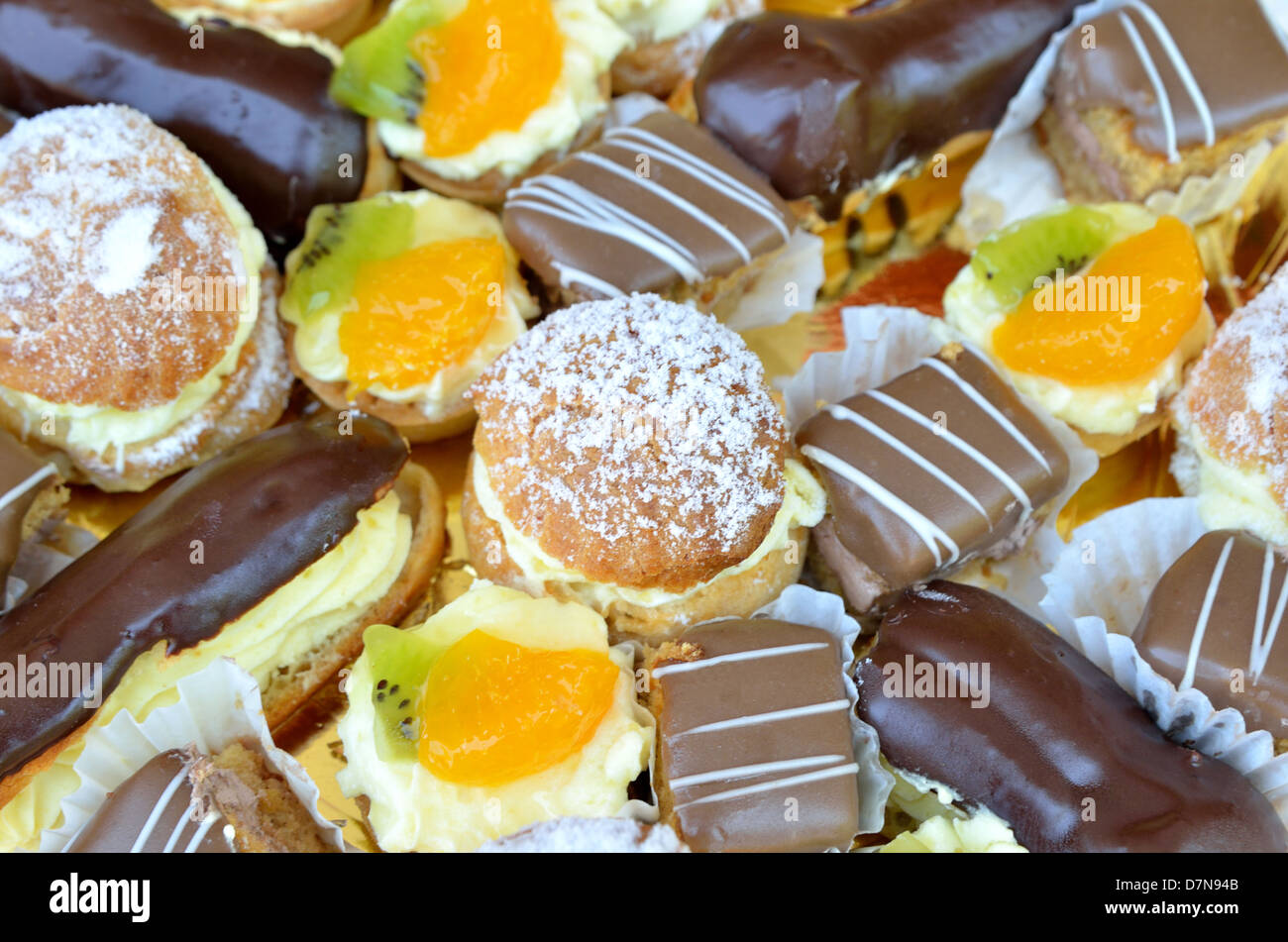 different kinds of desserts on a plate Stock Photo - Alamy