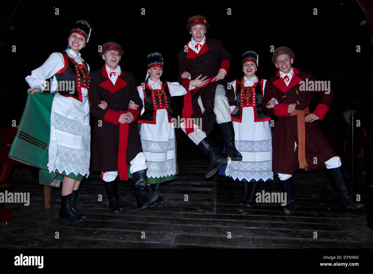 Traditional Polish dancers entertain members of the International ...