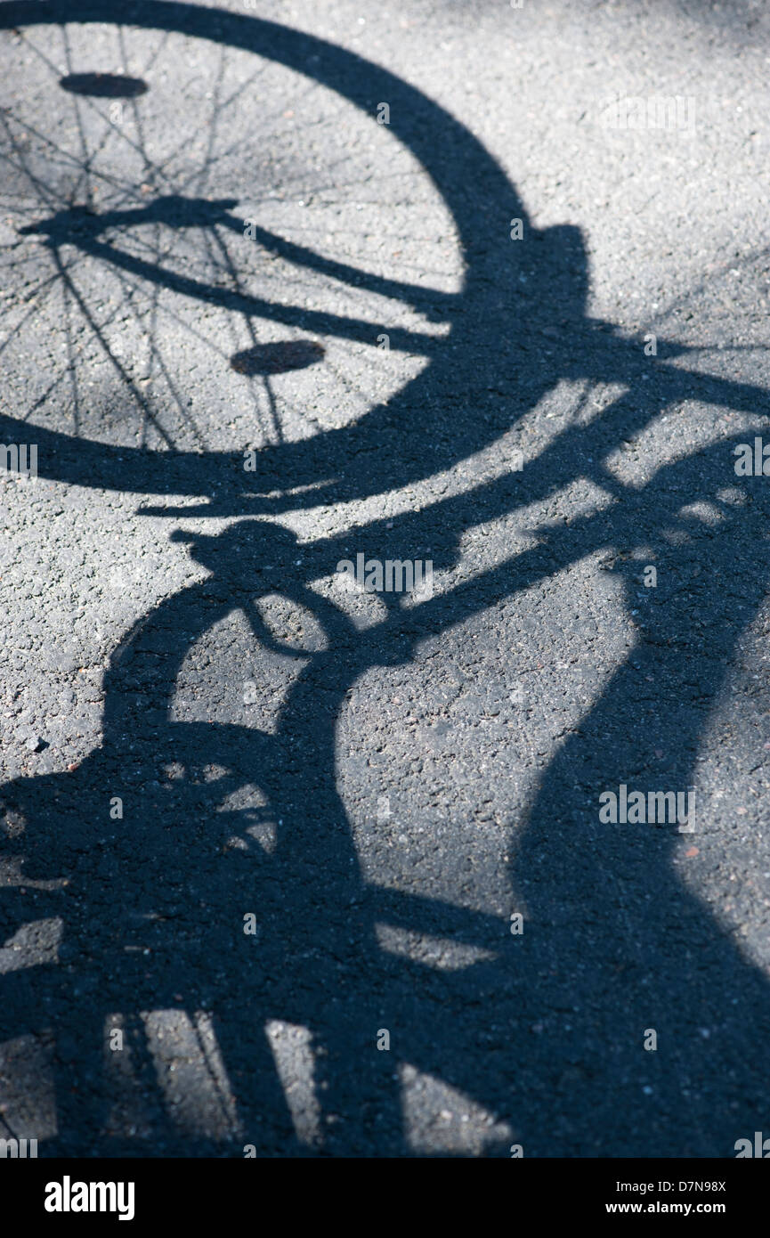 Shadow of bike Stock Photo - Alamy