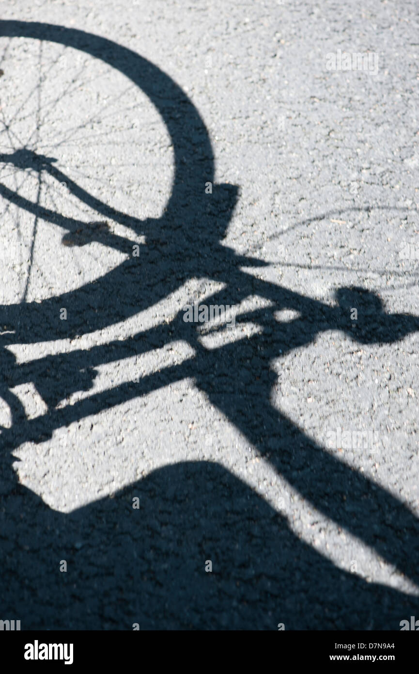 Shadow of bike Stock Photo - Alamy