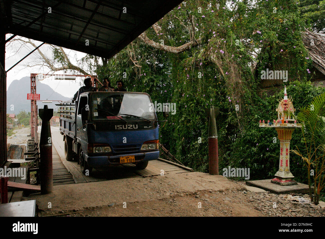 Vang Vieng's motorable bridge is flanked by ordnance from the Secret ...