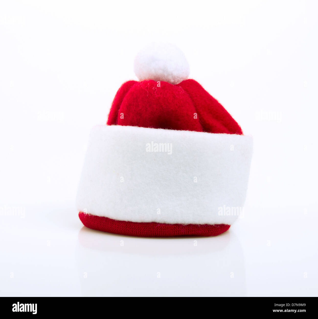 Red santa claus hat on white background Stock Photo - Alamy
