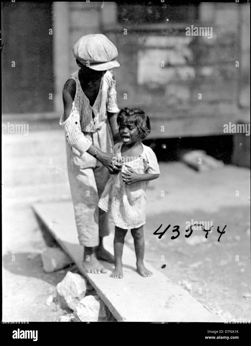 Two young children, one crying Stock Photo - Alamy