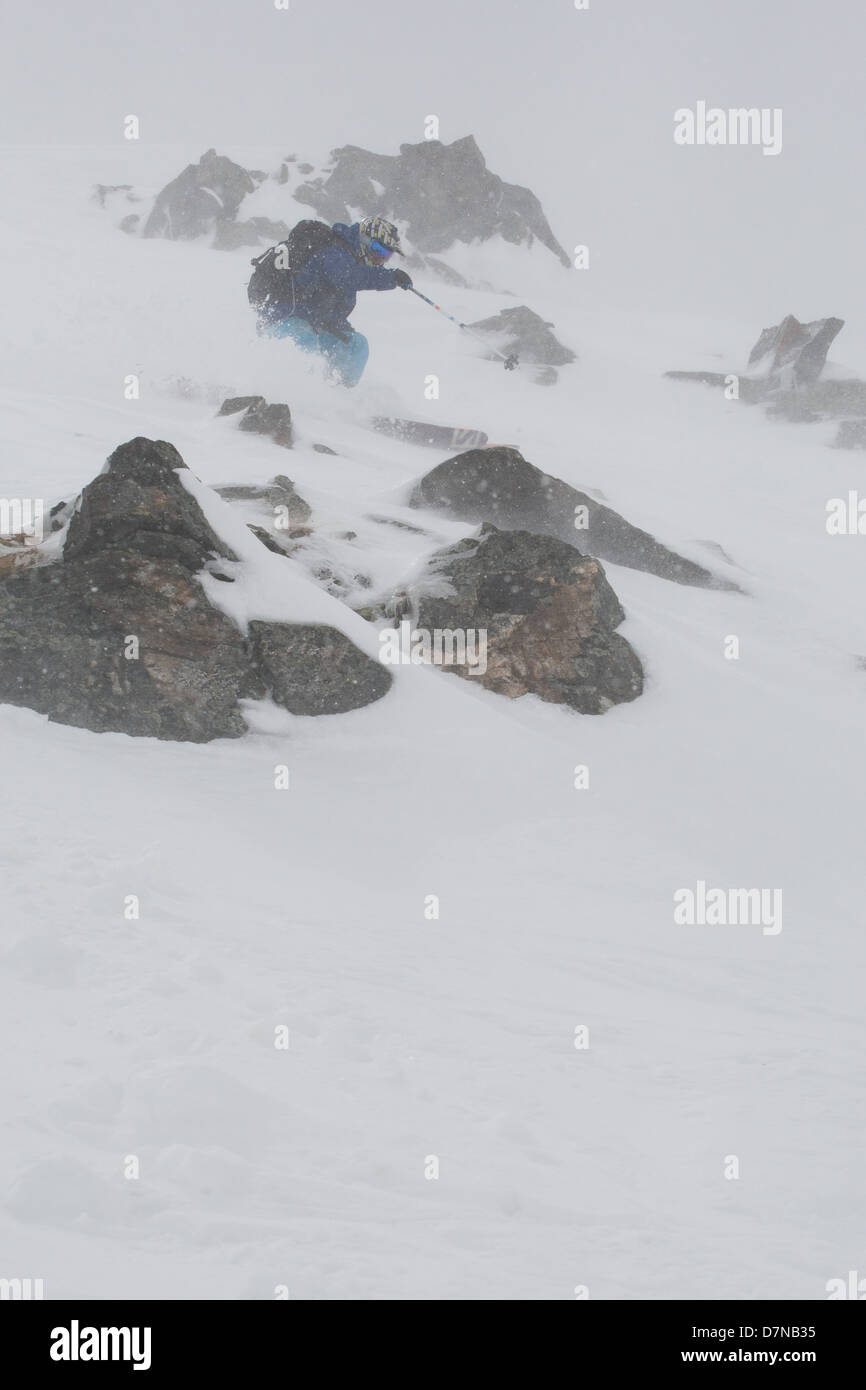 Skier having fun even in the fog Stock Photo - Alamy