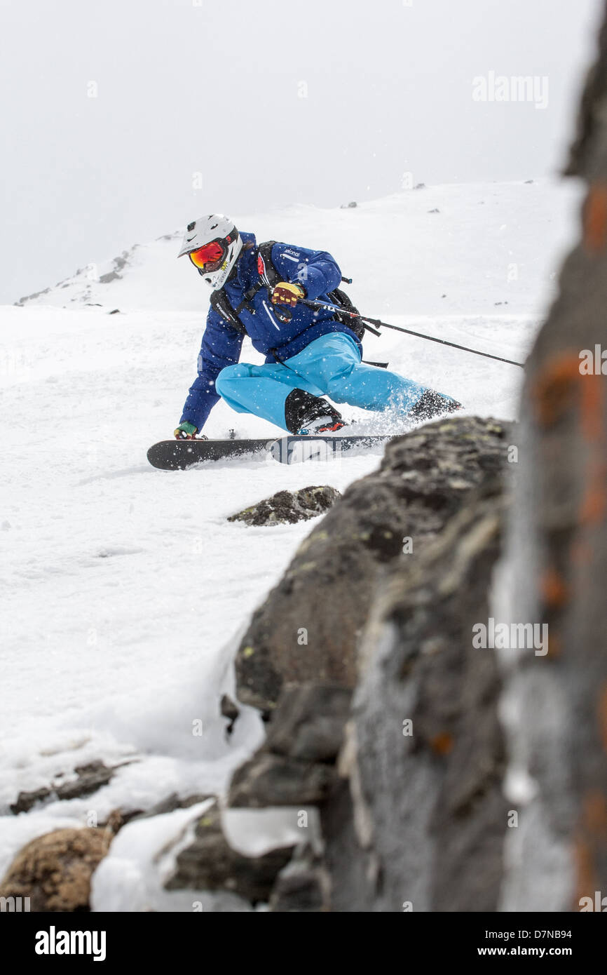 Skier turning on powder snow hi-res stock photography and images - Alamy