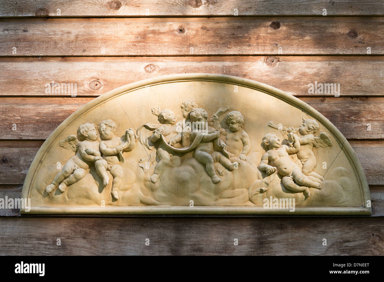 Ceramic Angel relief Stock Photo - Alamy