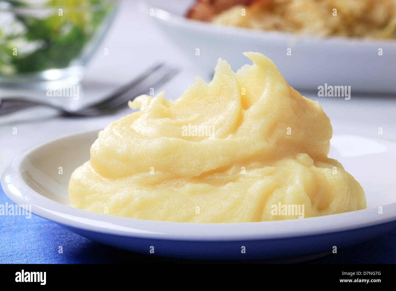 Portion of potato puree on plate Stock Photo - Alamy
