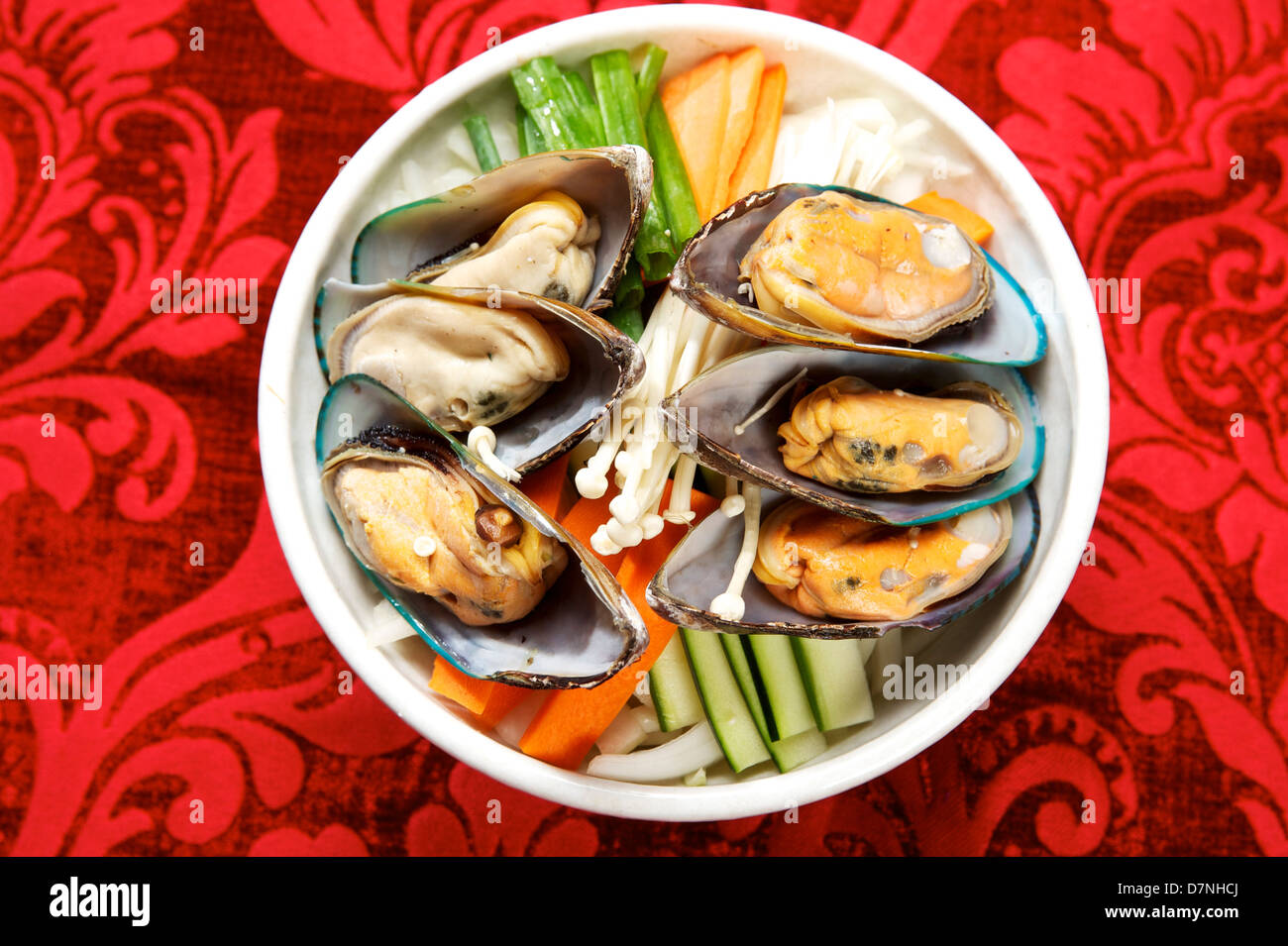 Korean seafood at a Korean restaurant. Mussels and noodles Stock Photo ...