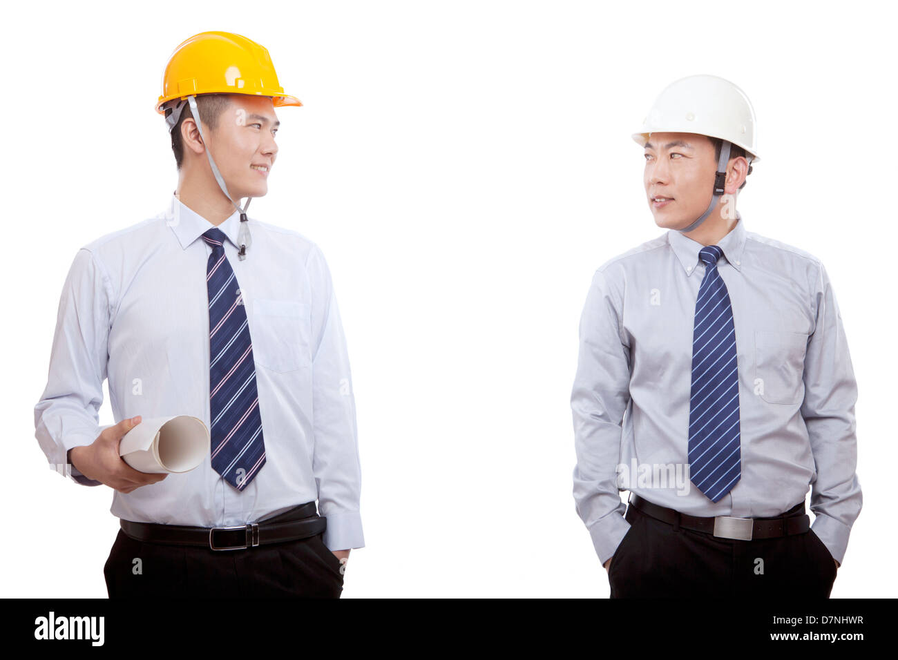 Two people engineer blueprint Cut Out Stock Images & Pictures - Alamy