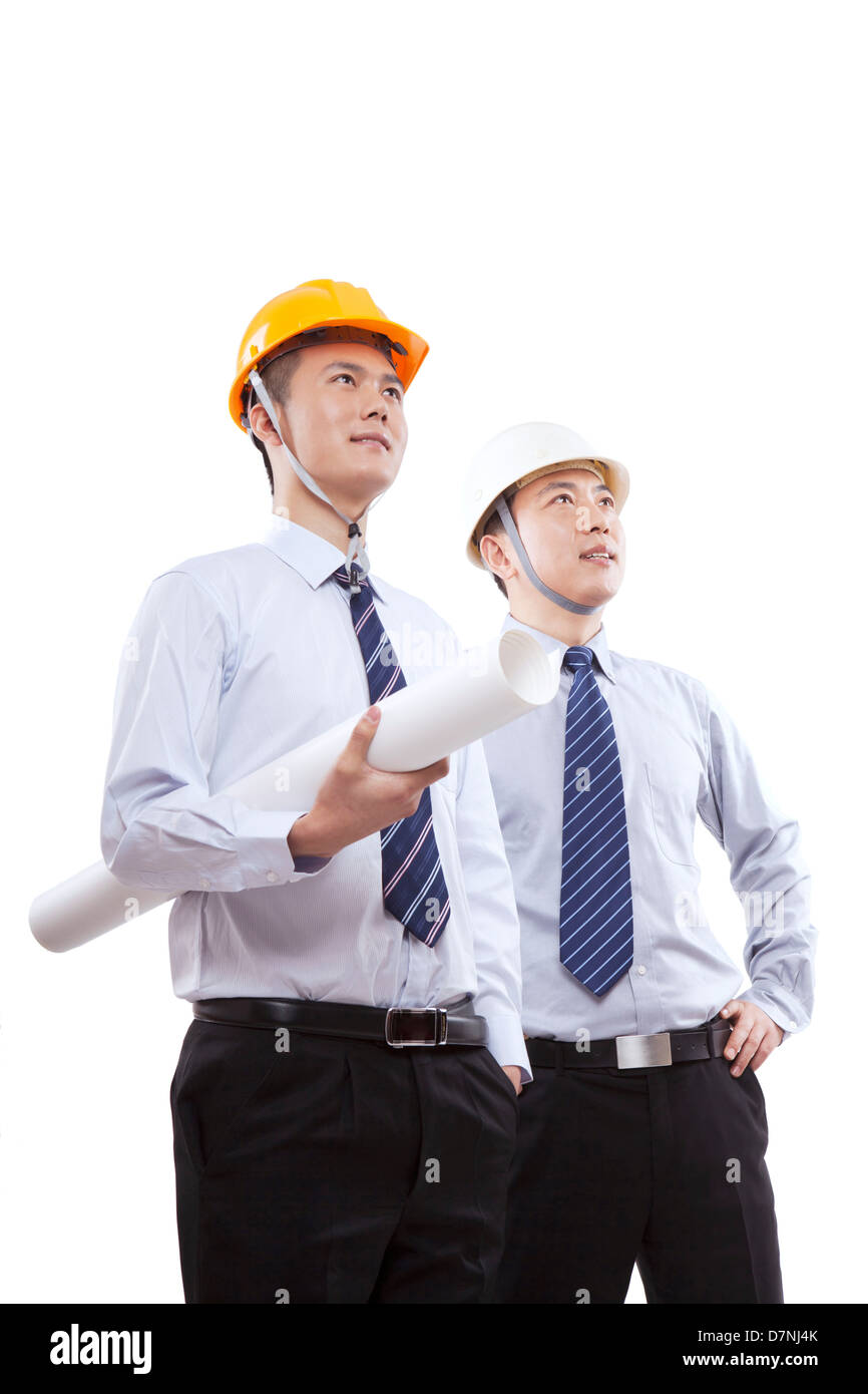 Wearing a safety helmet two engineer portrait Stock Photo - Alamy