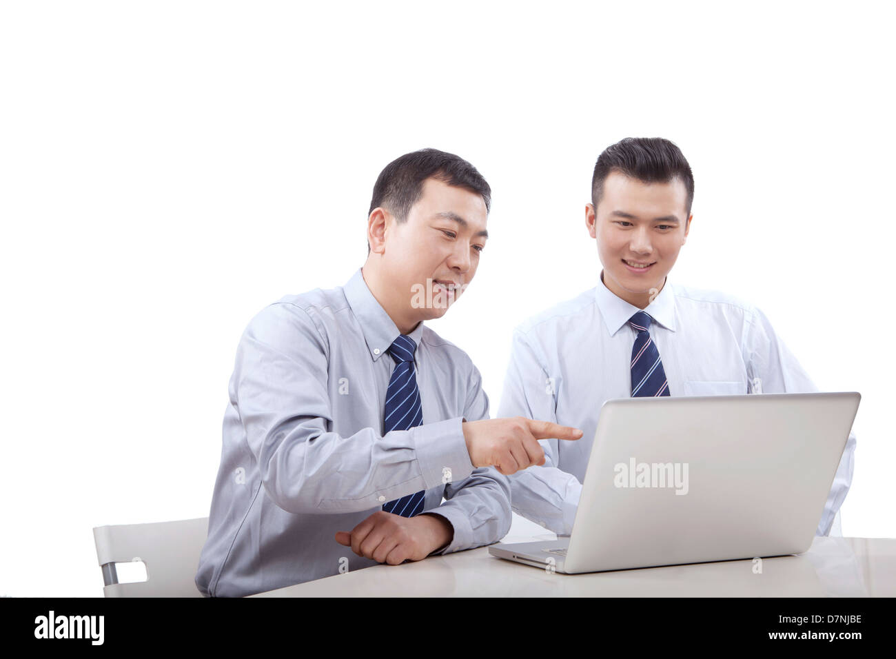 Two business men who use computer Stock Photo - Alamy