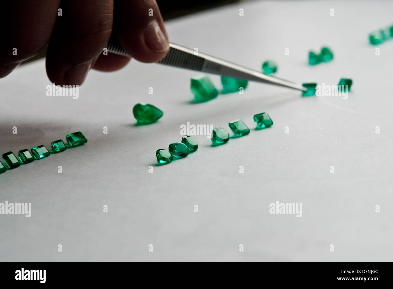 Fine emeralds seen after being processed in a cutting and polishing ...