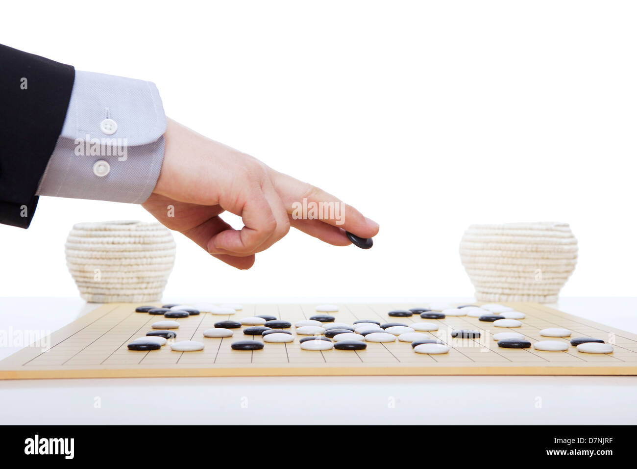 Business people playing GO Stock Photo - Alamy