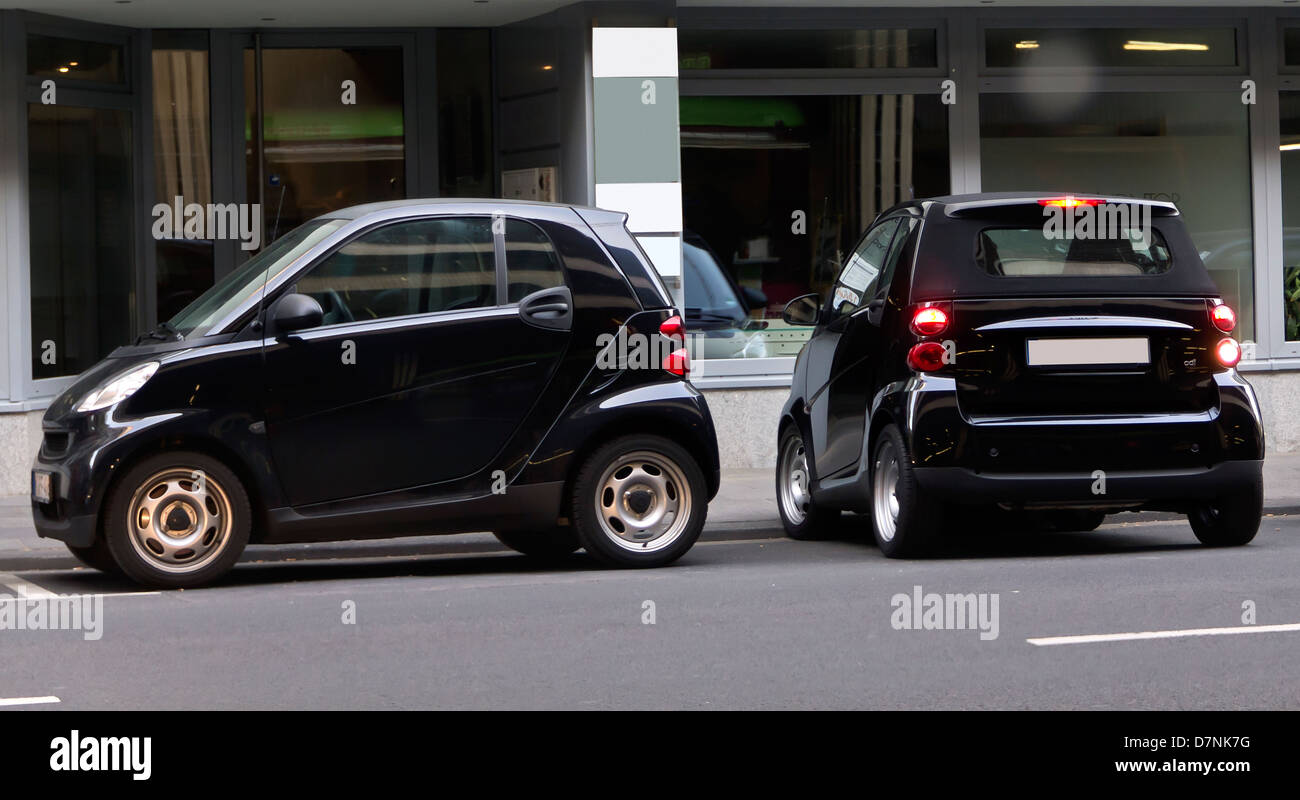 Mini cars in the parking lot Stock Photo - Alamy