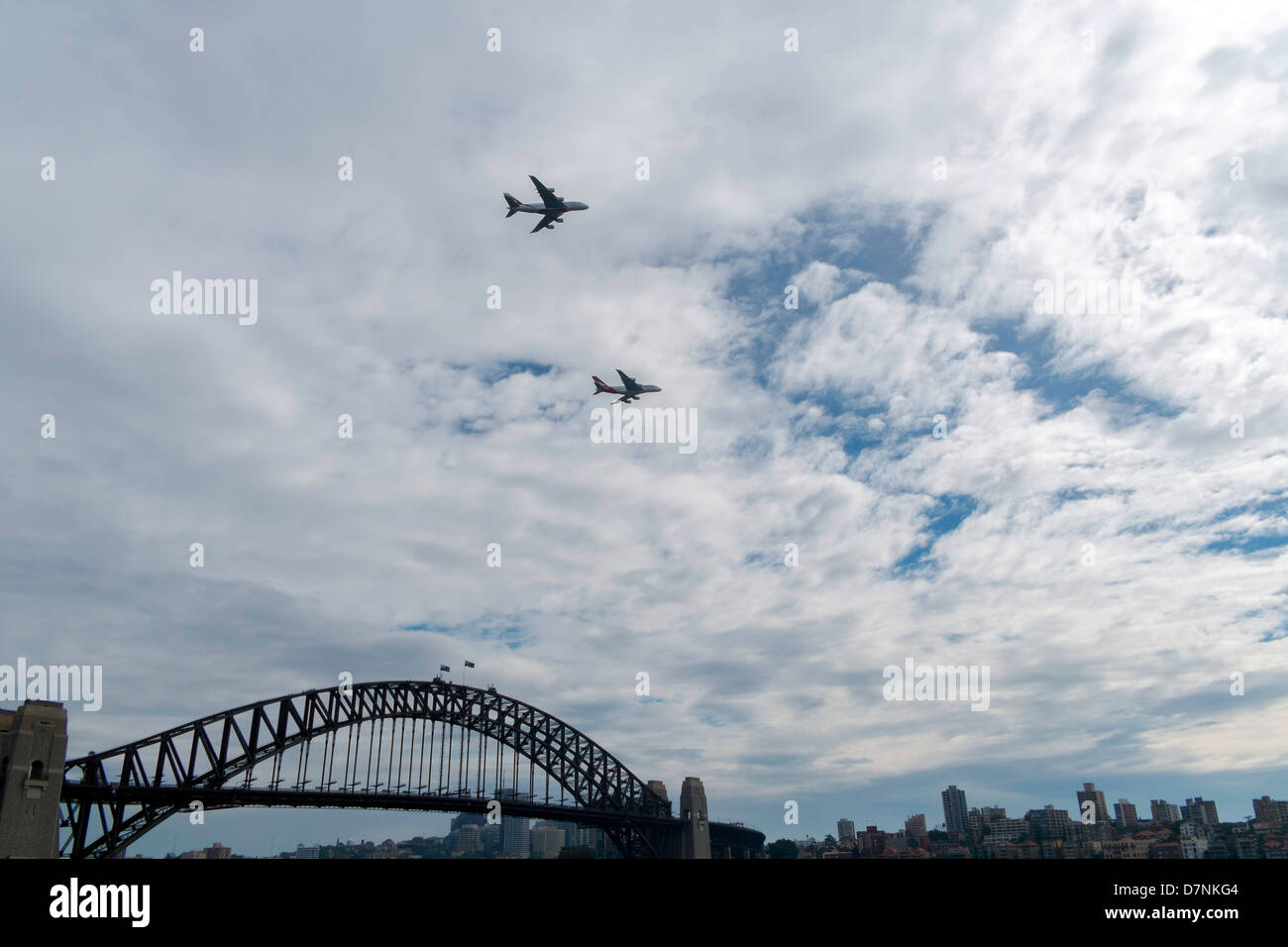 Qantas and Emirates A230 airplanes flying in formation over the Sydney ...