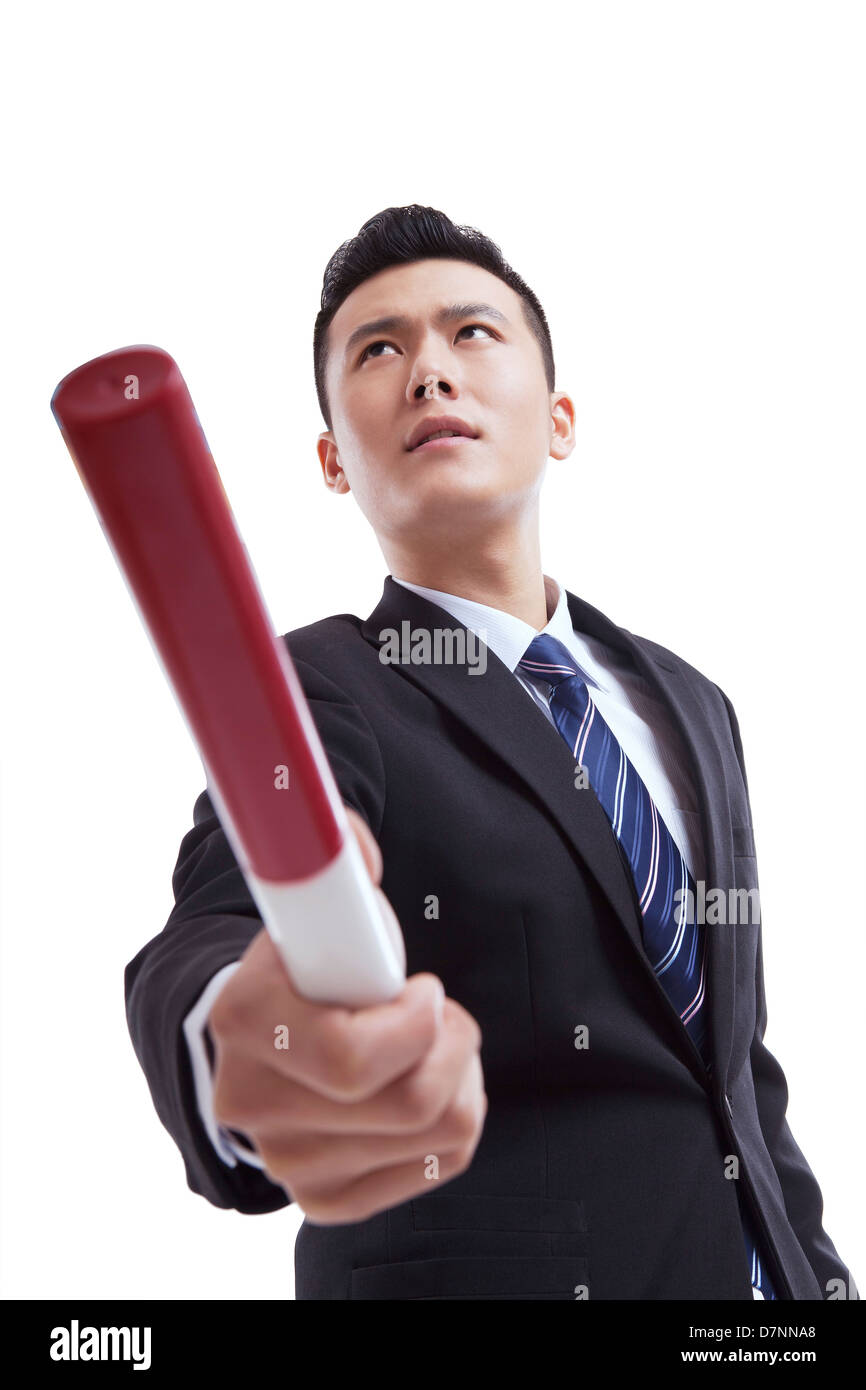 Holding the baton of business man Stock Photo - Alamy
