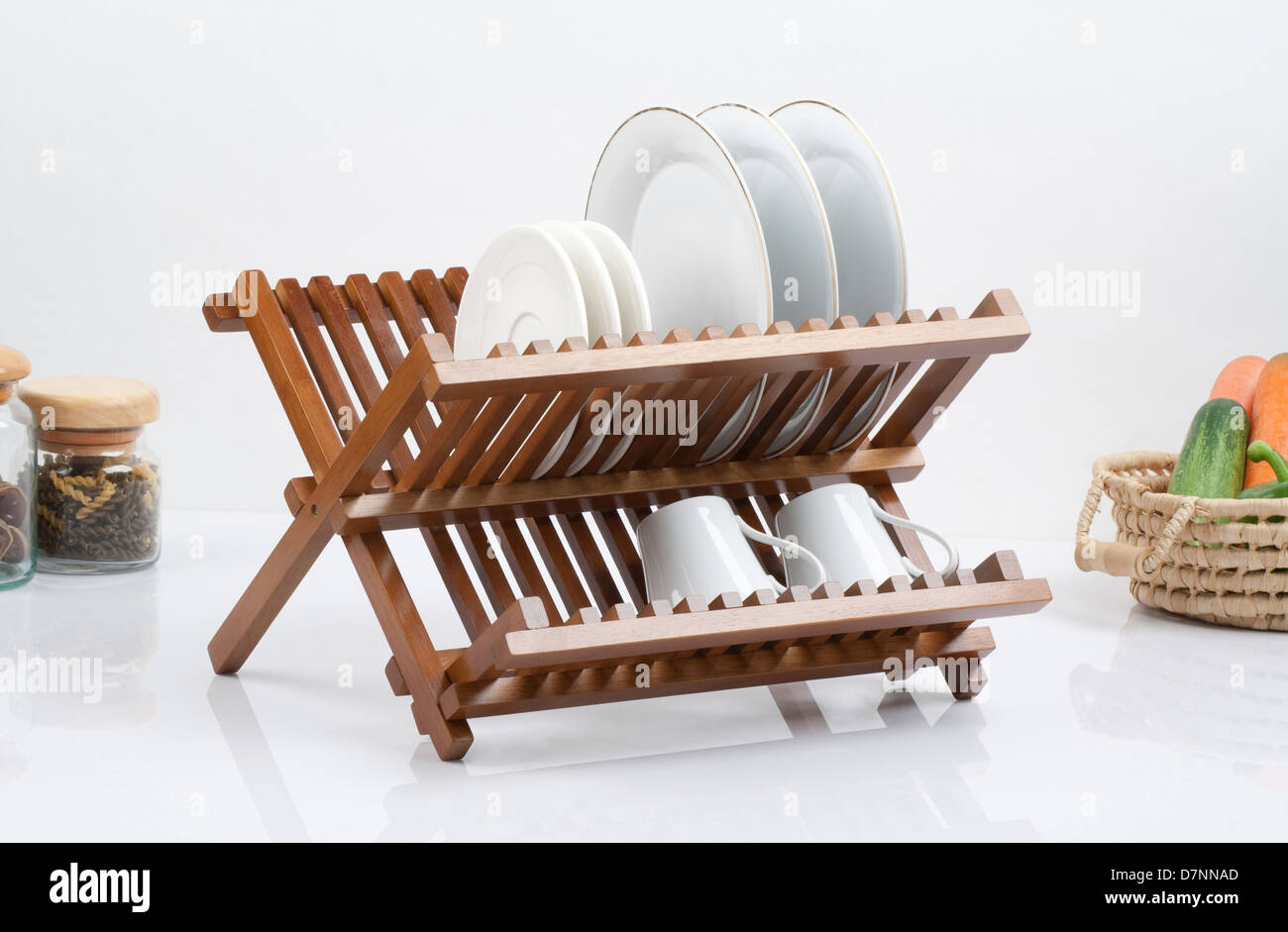 A small wooden shelf for keeping dishes and cups Stock Photo - Alamy