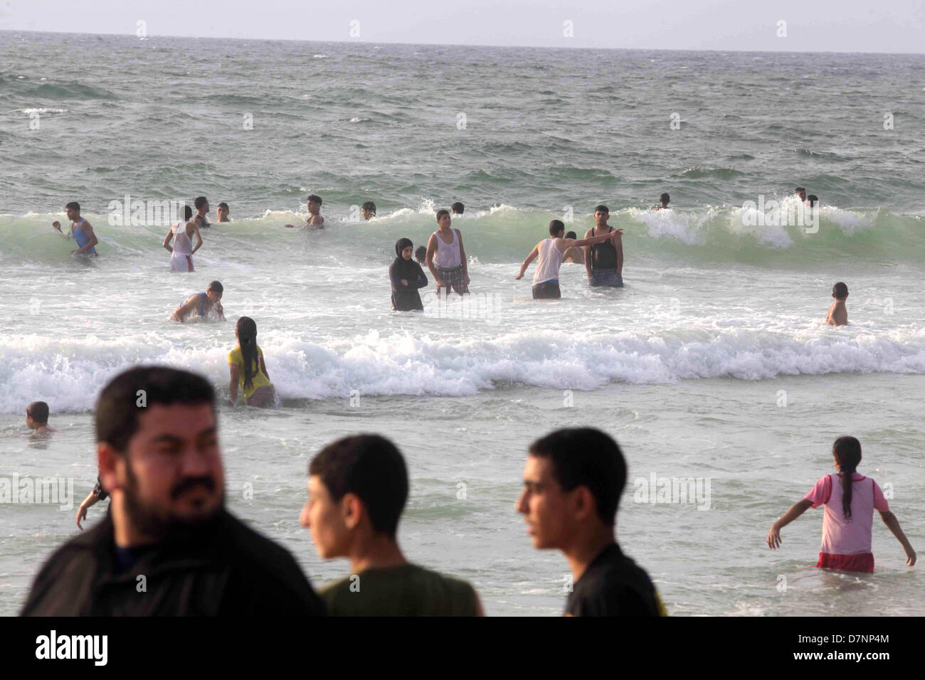 Gaza City, Gaza Strip. May 10, 2013. Palestinians enjoy swimming in the ...