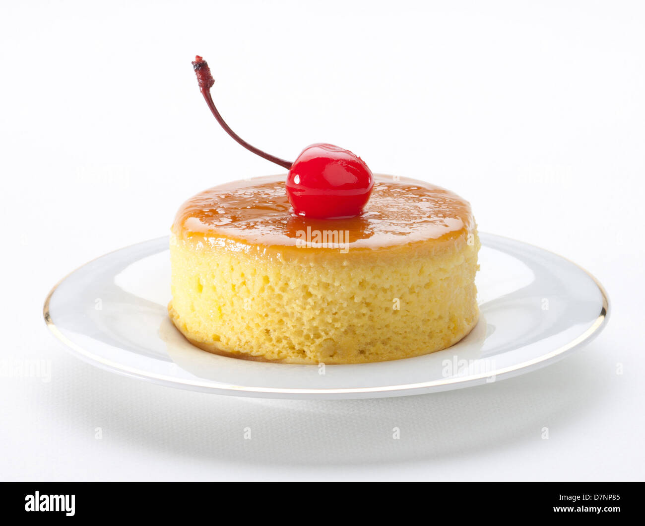 Sweet mango tart with cherry topping Stock Photo - Alamy