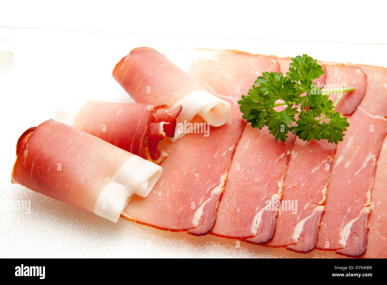 Farm ham with parsley Stock Photo - Alamy