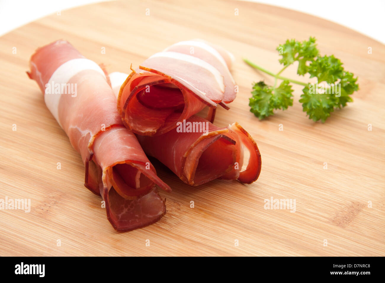Farm ham with parsley Stock Photo - Alamy