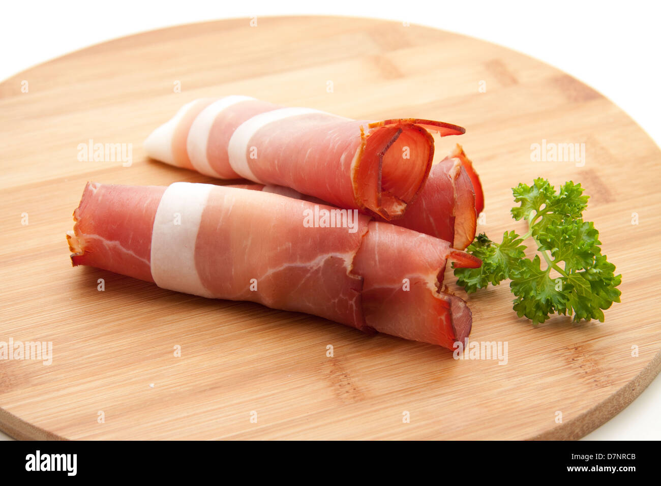 Farm ham with parsley Stock Photo - Alamy