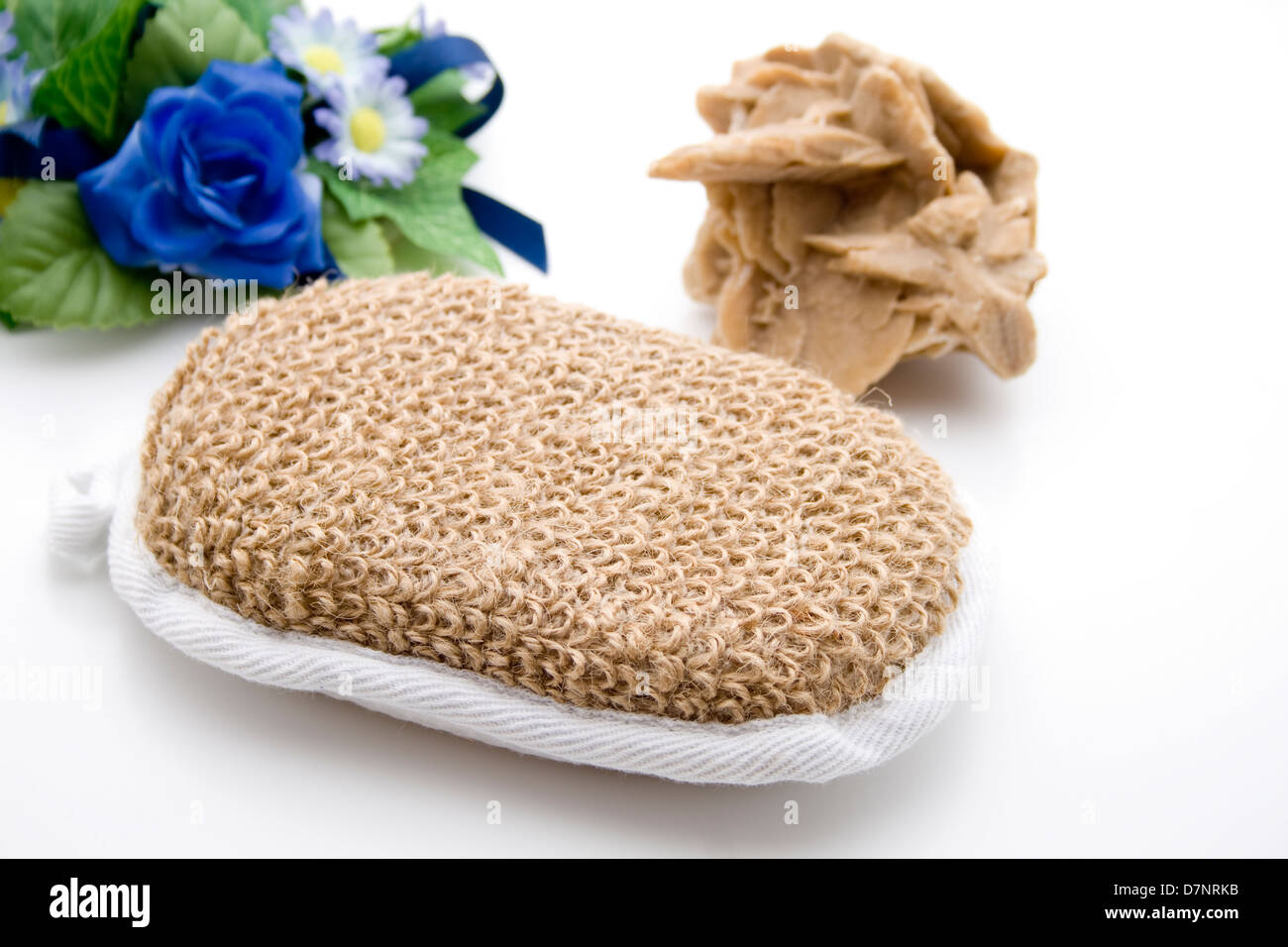 Massage sponge with stone Stock Photo - Alamy