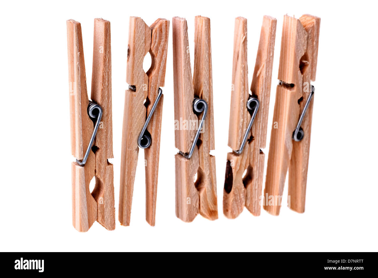 wooden clothes pins. Isolated on white background Stock Photo - Alamy