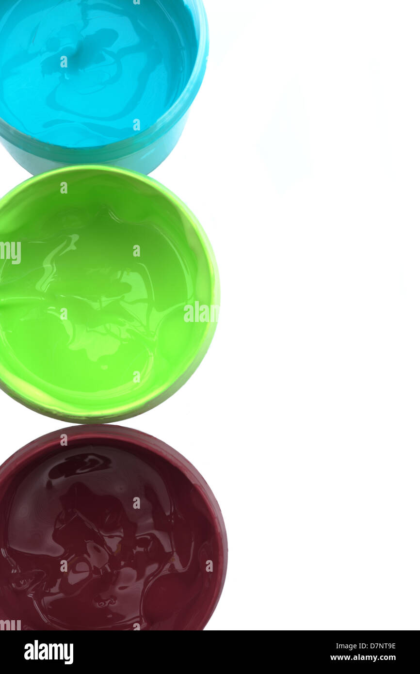 Small sampler pots of paint on a white background Stock Photo - Alamy