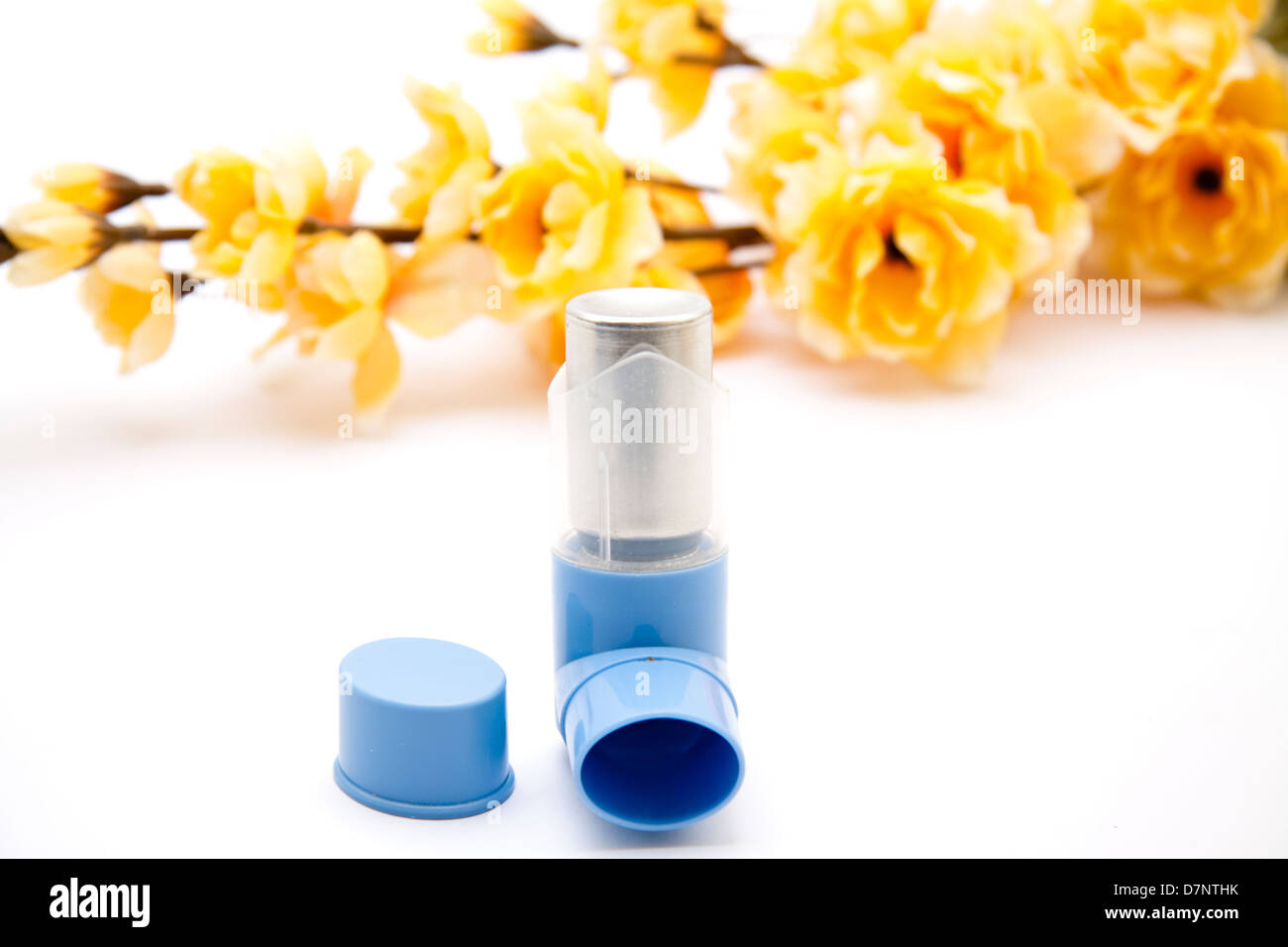 Asthma spray with flower Stock Photo - Alamy