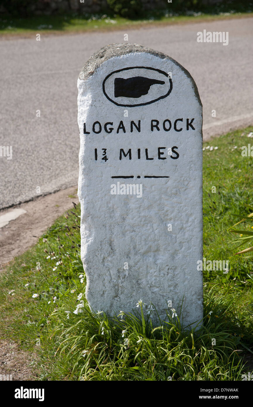 Milestone marker pointing to Logan Rock Cornwall England UK Stock Photo ...