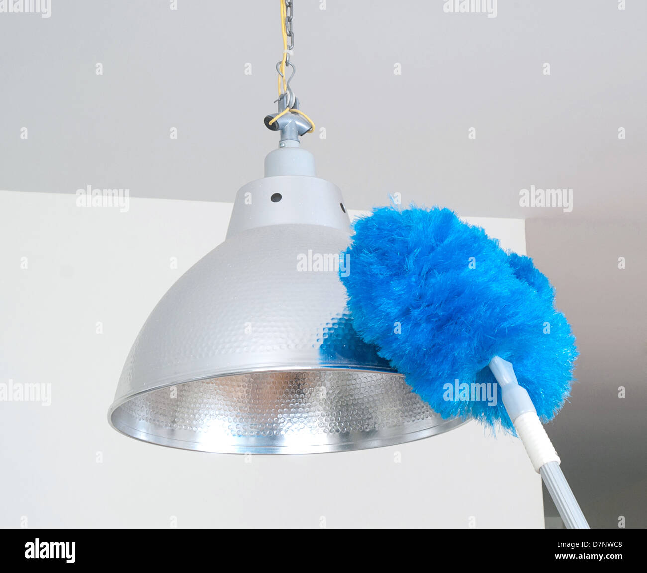 Feather duster and hand hi-res stock photography and images - Alamy