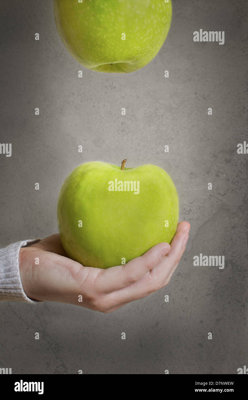 Hand holding apple symbol of natural hi-res stock photography and ...