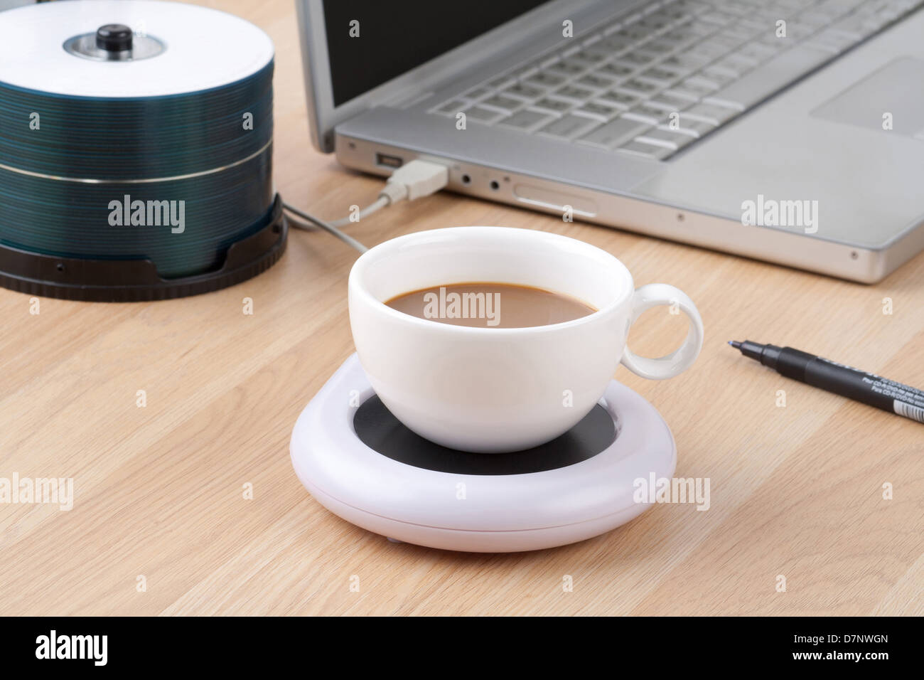 Keep your coffee always warm by coffee cup warming machine Stock Photo ...