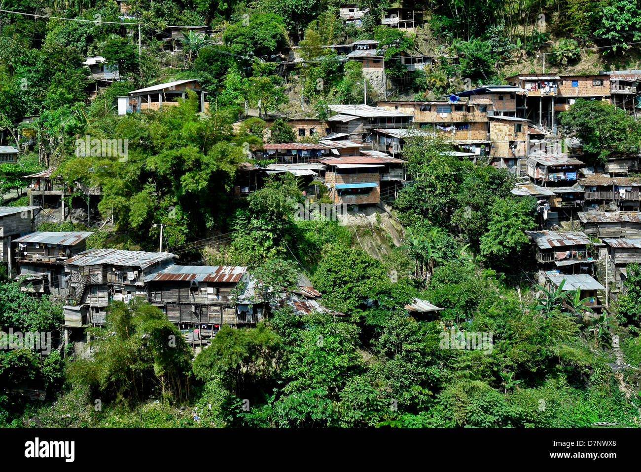 Poor shacks made from scrap wood and sheetmetal seen in the hills ...