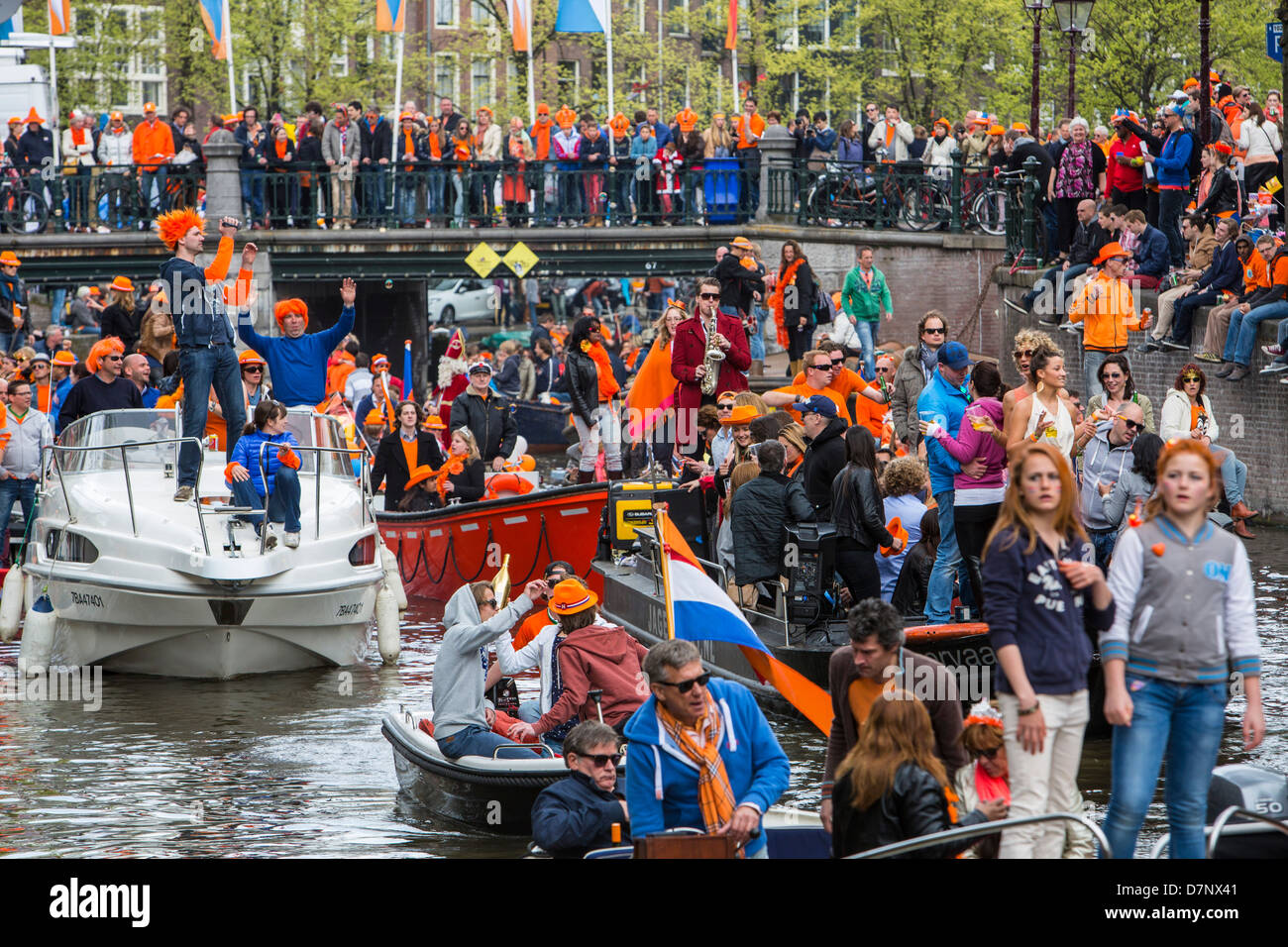 Annual Queens Day in The Netherlands. Boat parade in the canals of ...