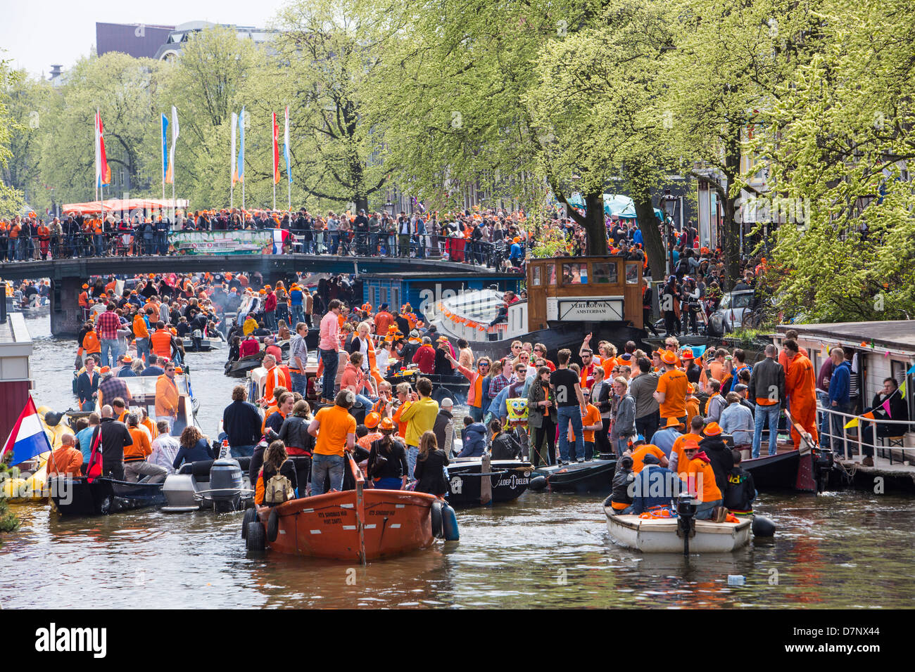 Annual Queens Day in The Netherlands. Boat parade in the canals of ...